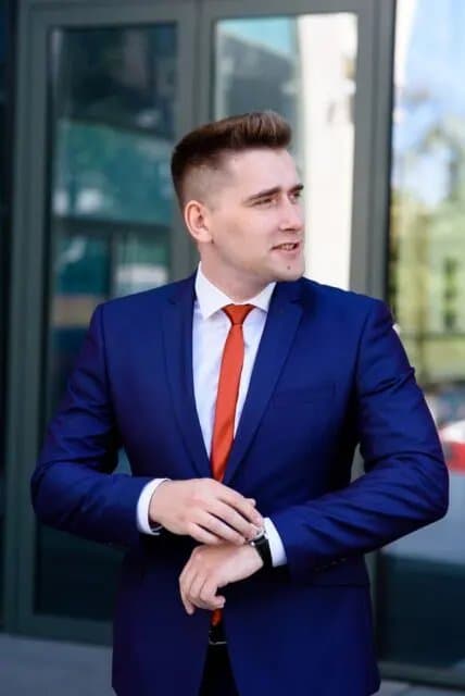 How To Wear A Blue Suit With A Red Tie